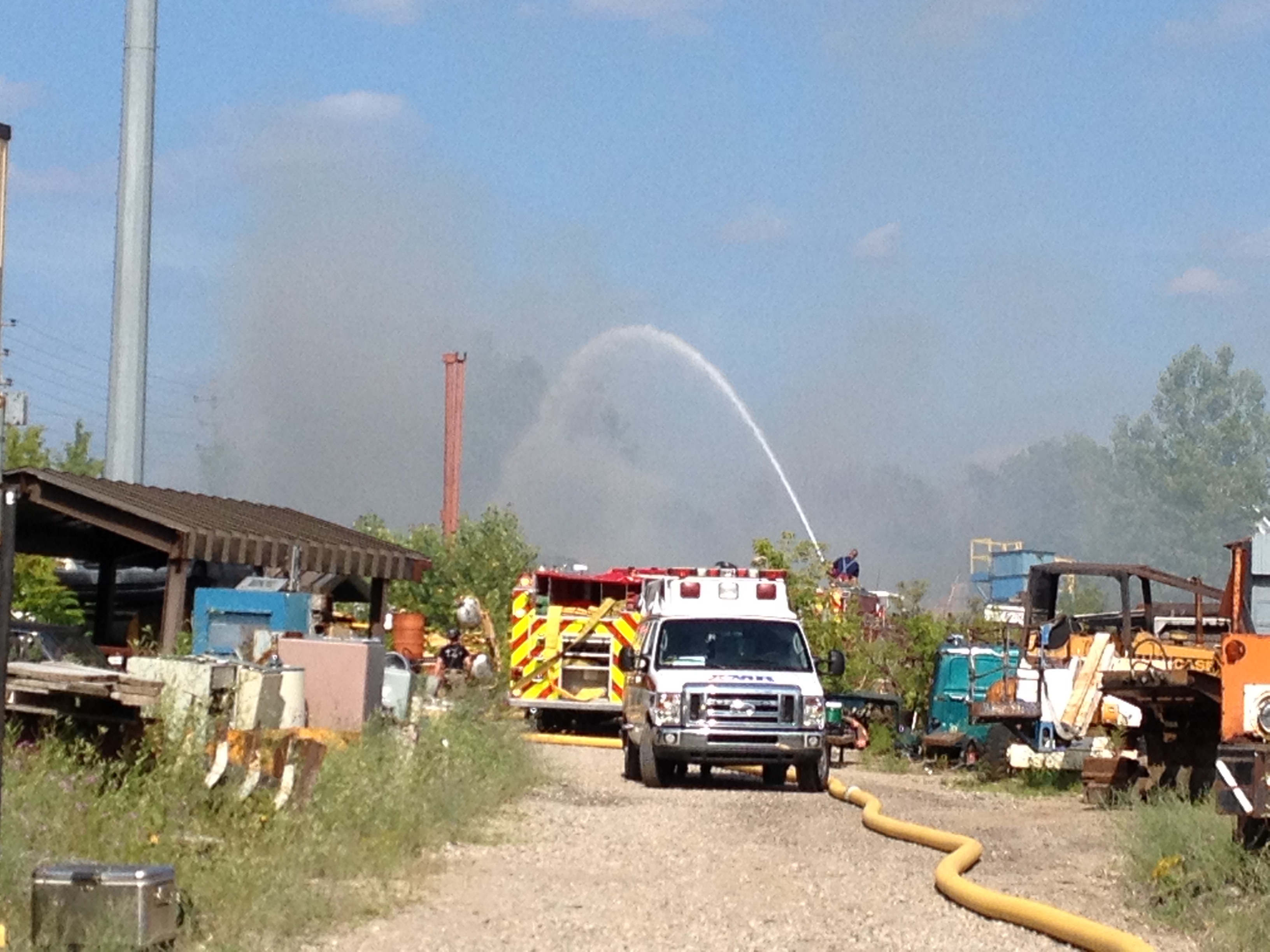 Business fire shuts down Alpine Ave between Ann and Richmond | wzzm13.com