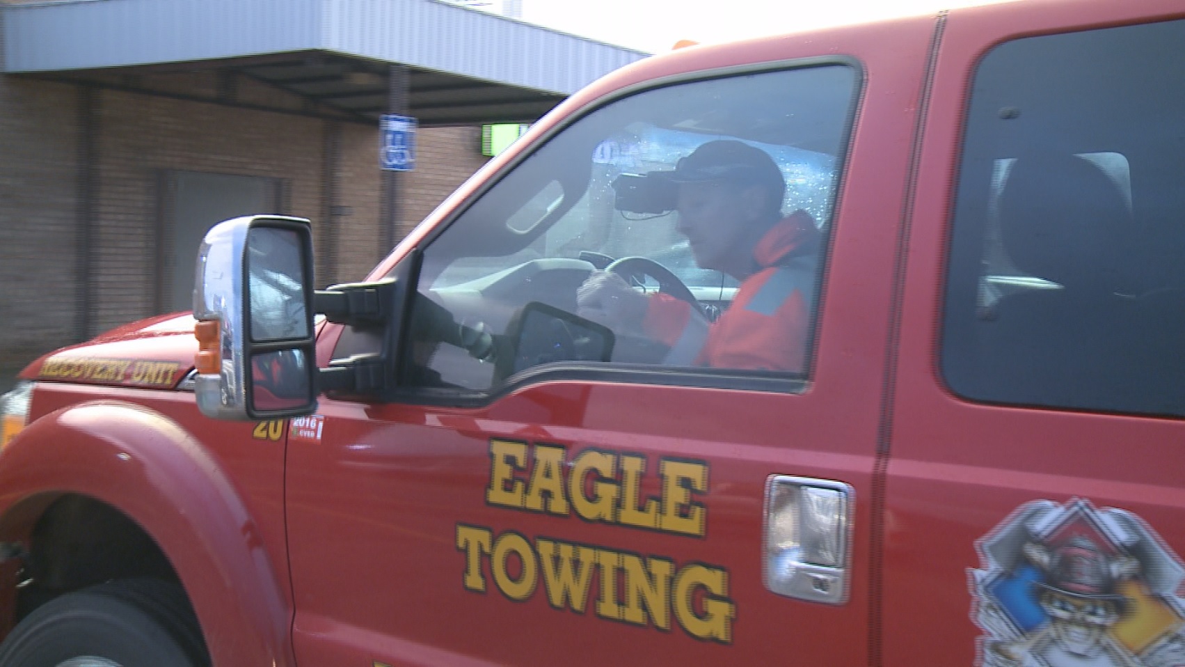 Tow truck driver awarded medal for bravery | wzzm13.com