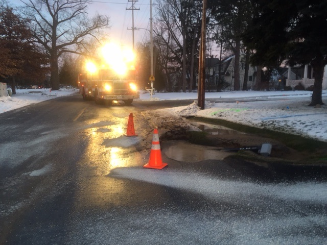Water main break causes sinkhole, school bus accident | wzzm13.com