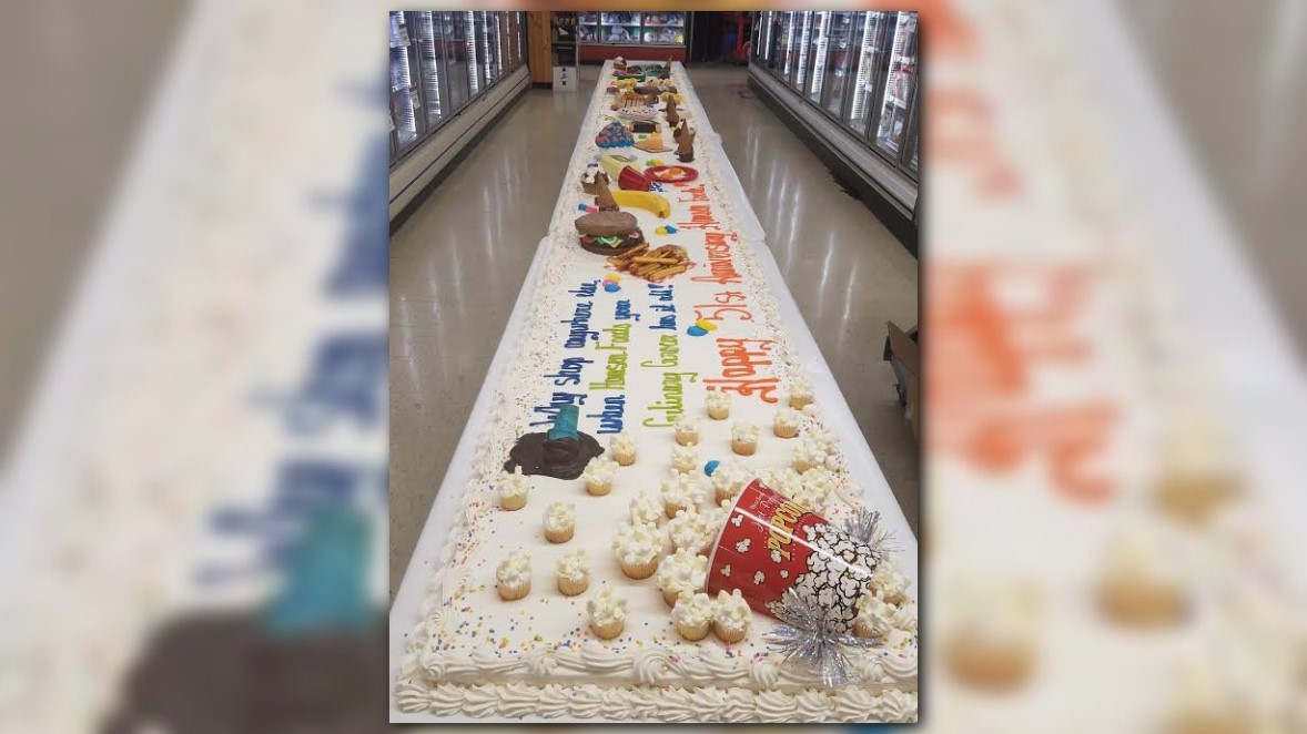 Tasty! A 16-ft long cake commemorates a local grocery store's 51 years ...